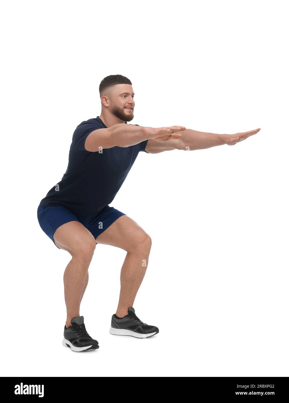 Man doing squats on white background. Morning exercise Stock Photo - Alamy