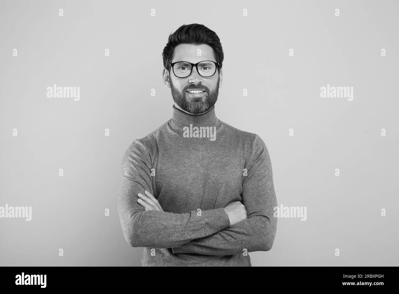 Portrait of handsome man on light background. Black and white effect ...