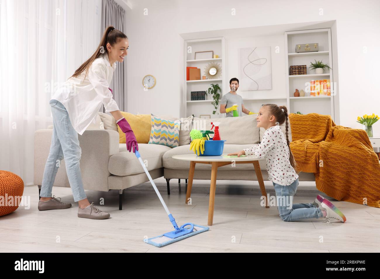 Child tidying up house hi-res stock photography and images - Alamy