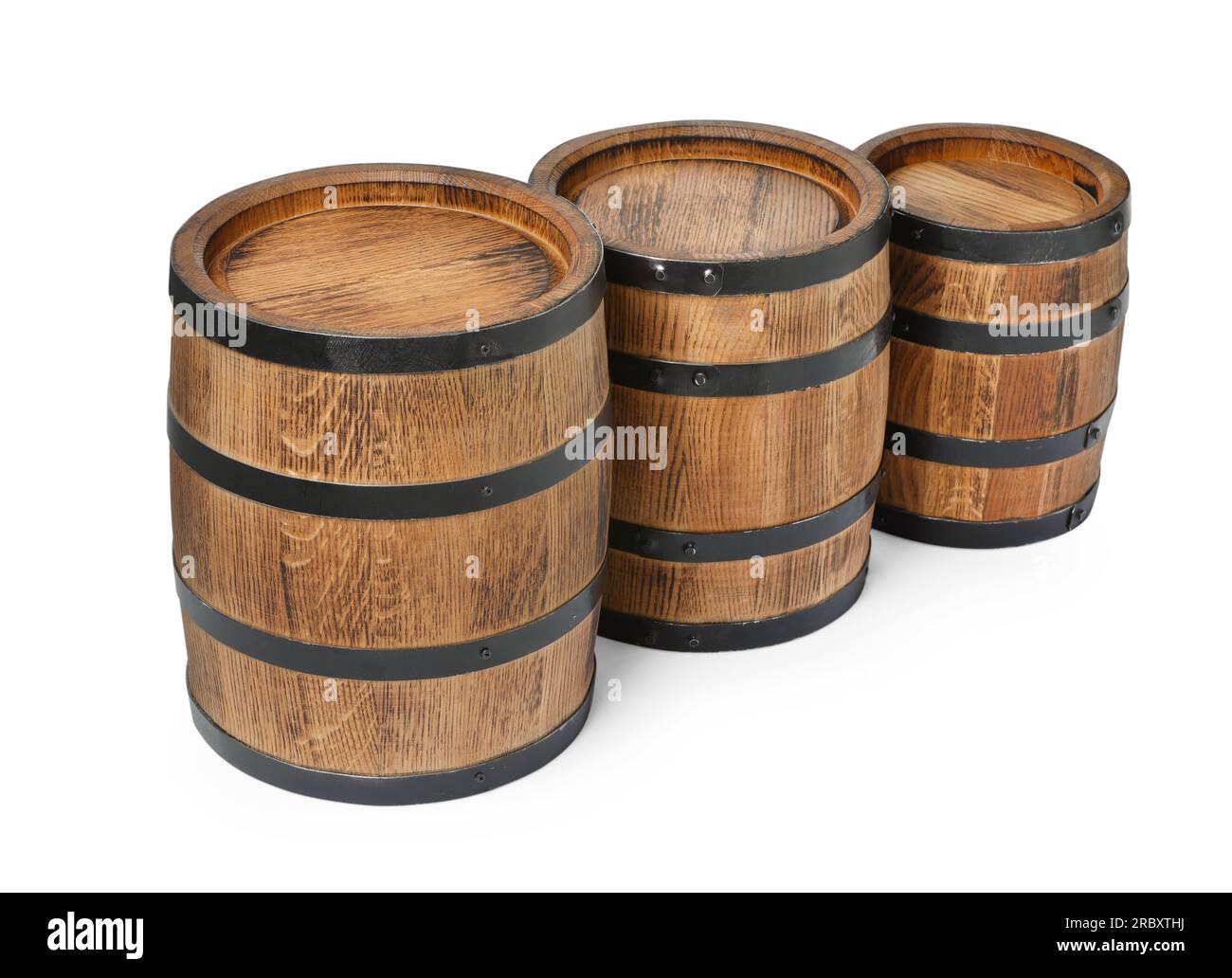 Three traditional wooden barrels on white background Stock Photo - Alamy