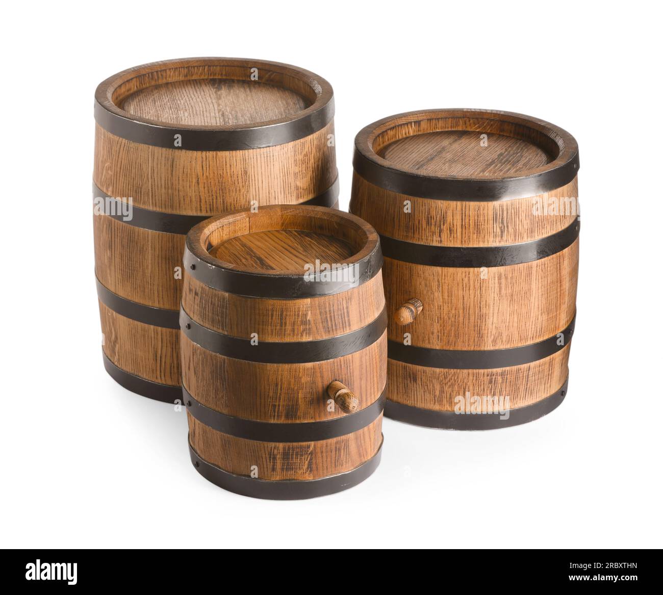 Three traditional wooden barrels on white background Stock Photo - Alamy