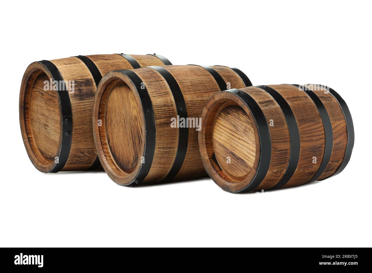 Three traditional wooden barrels on white background Stock Photo - Alamy