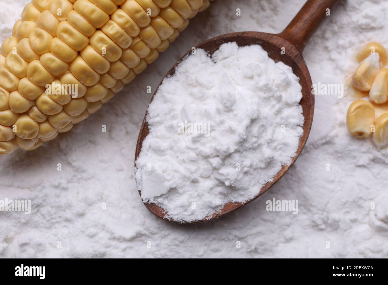 White corn starch, ripe cob and kernels on powder, top view Stock Photo ...