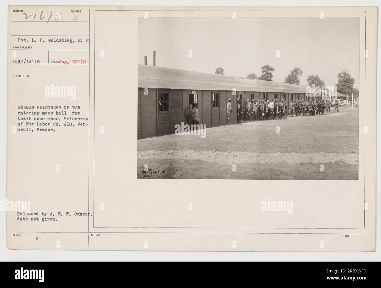 German prisoners of war entering a mess hall for their noon meal at ...
