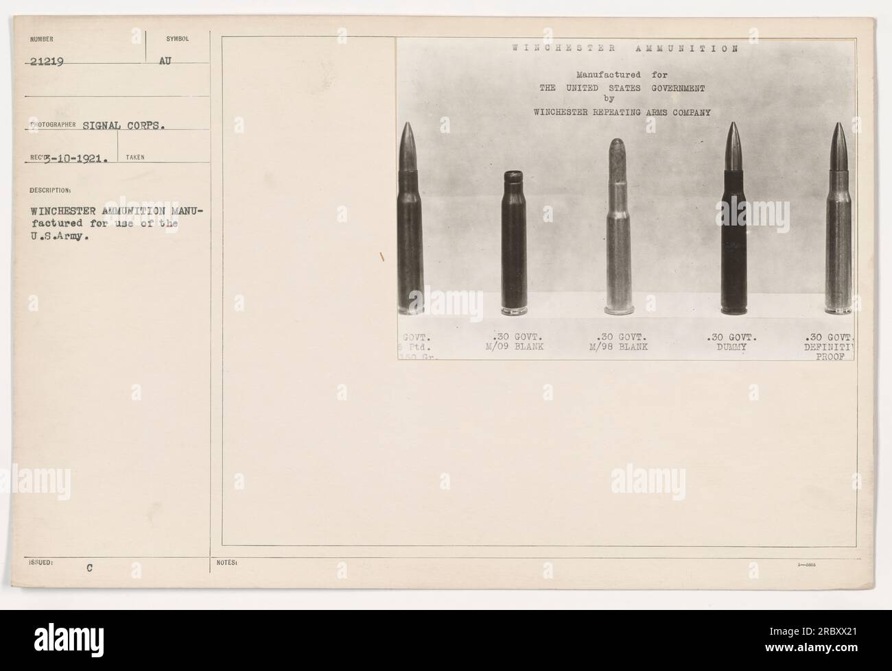 Caption: "A photographer from the Signal Corps captures an image of ...