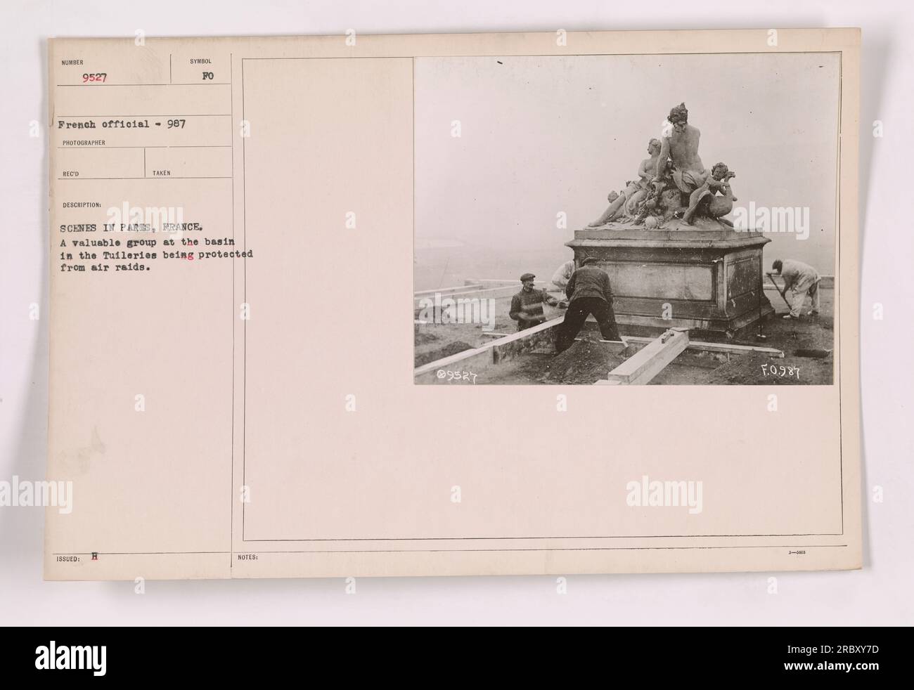 French officials and soldiers protect a group of valuable items at the ...