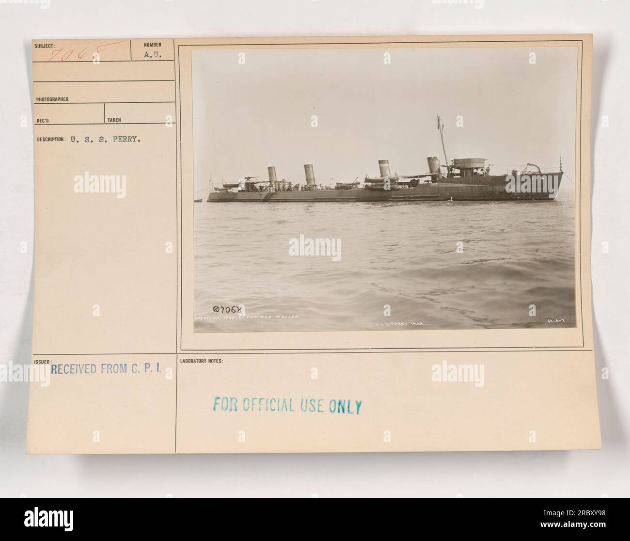 U.S. Navy sailors posing on the deck of the USS Perry during World War ...
