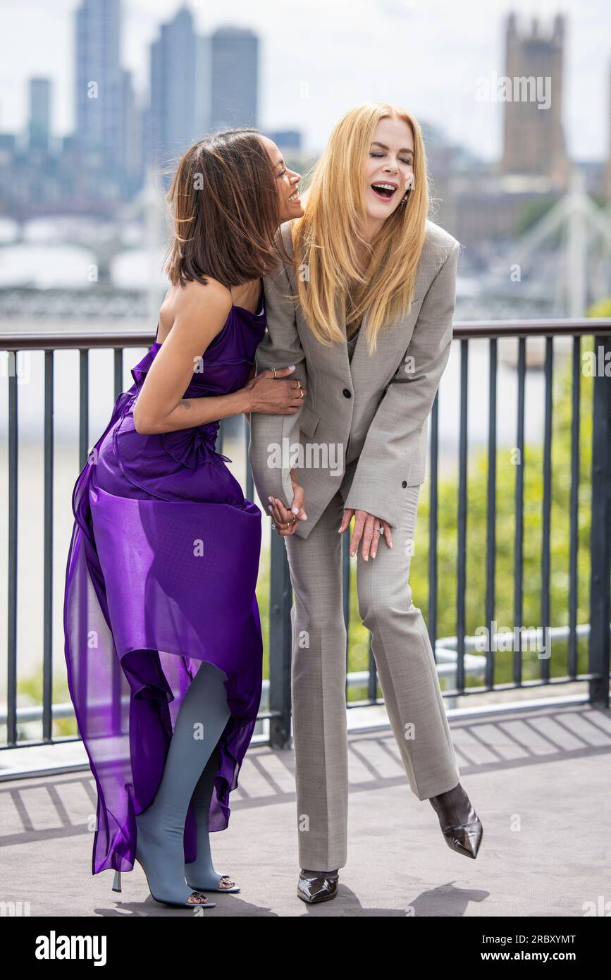 Zoe Saldana, left, and Nicole Kidman pose for photographers during a ...