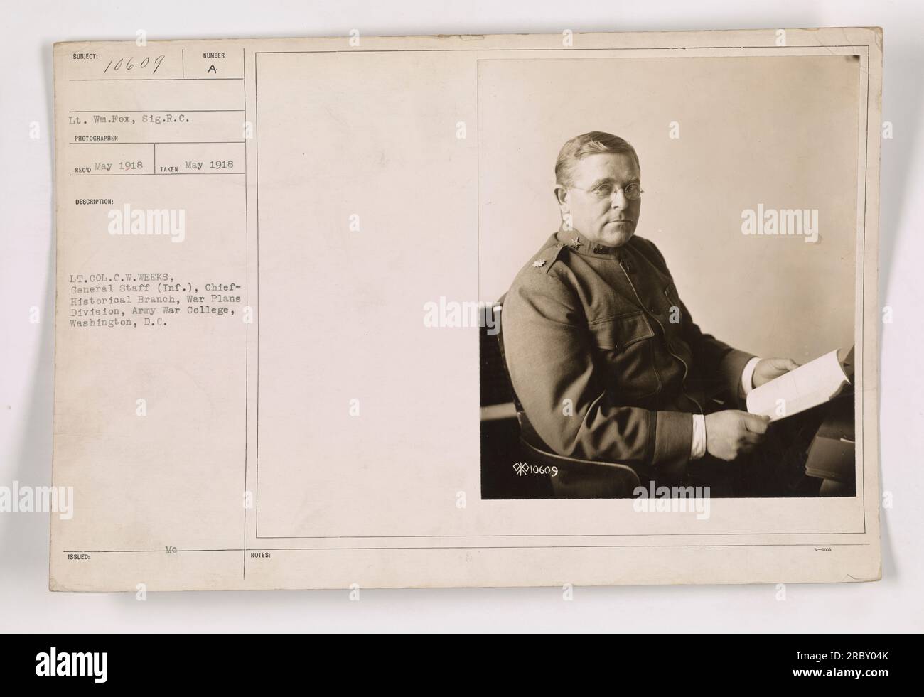 American soldiers advance through a muddy battlefield during World War ...