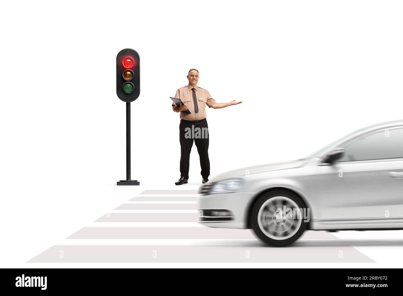 Security officer holding a clipboard and pointing at a vehicle on a ...