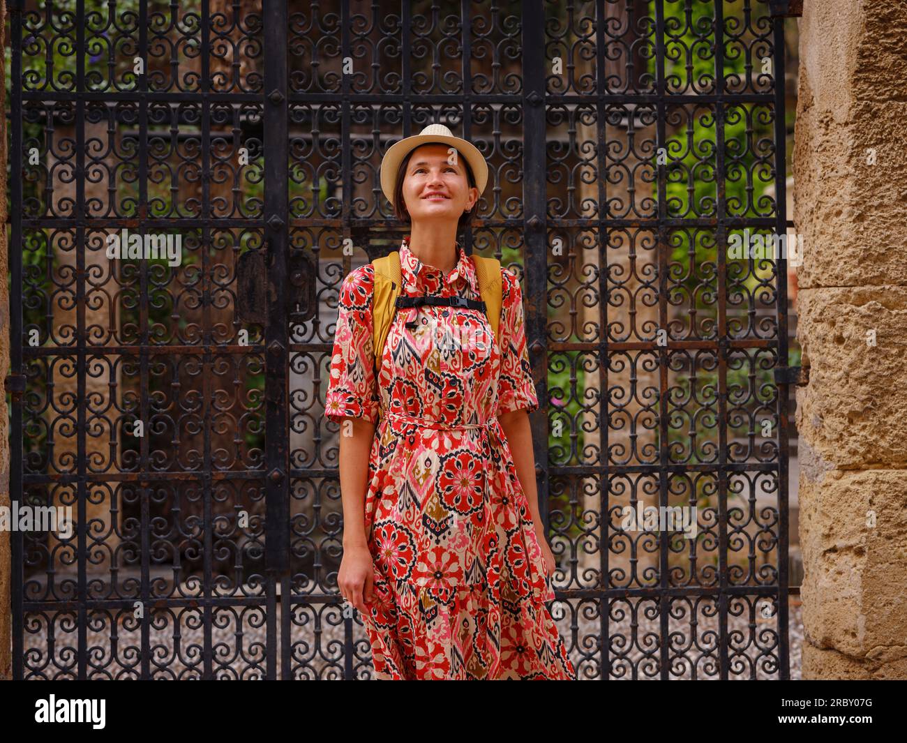summer trip to Rhodes island, Greece. Young Asian woman in ethnic red ...