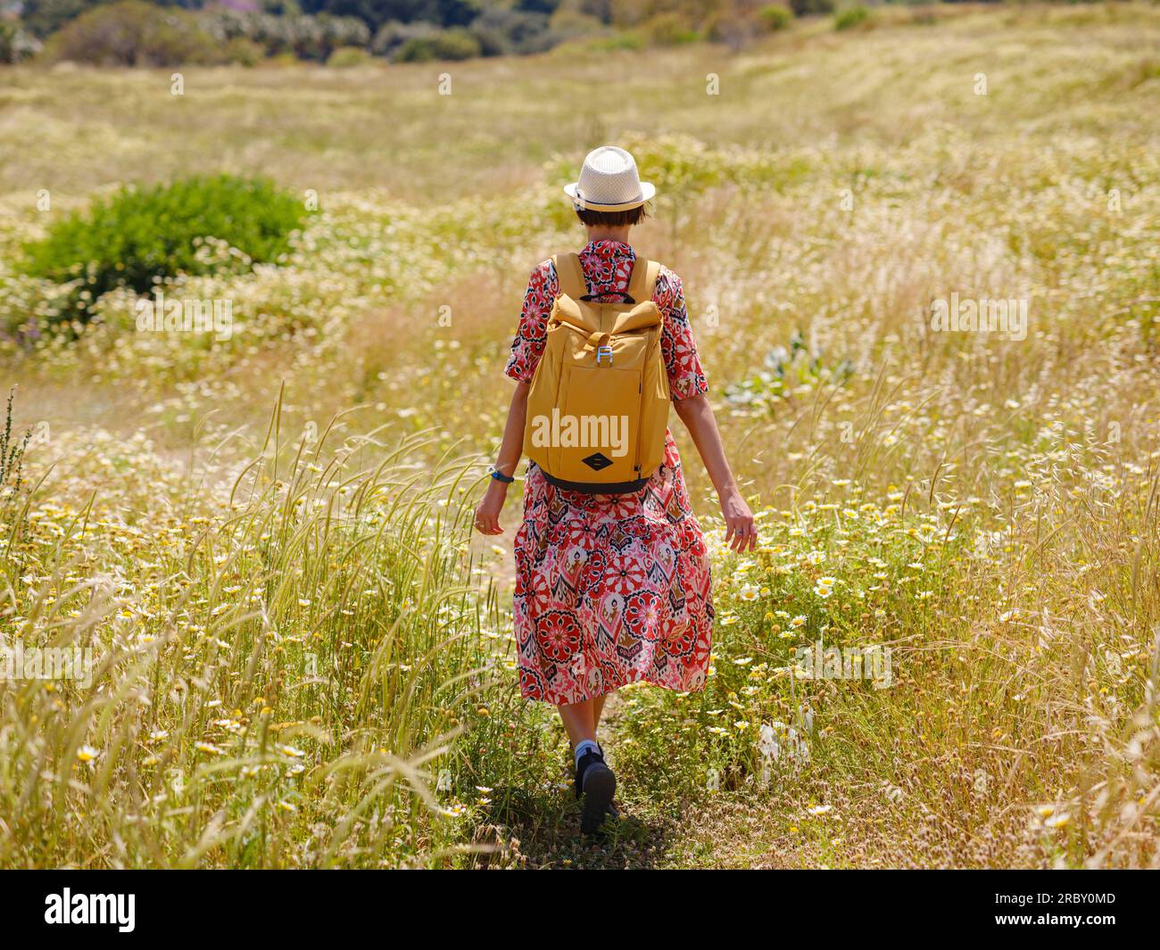 summer trip to Rhodes island, Greece. Young Asian woman in ethnic red ...
