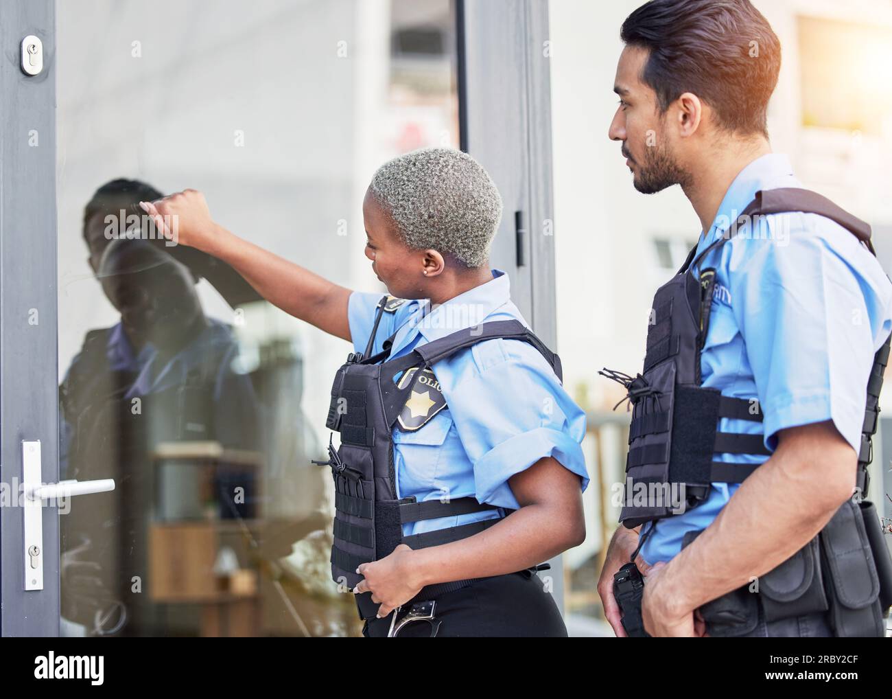 Crime, patrol and police knocking on a door for justice, security and ...