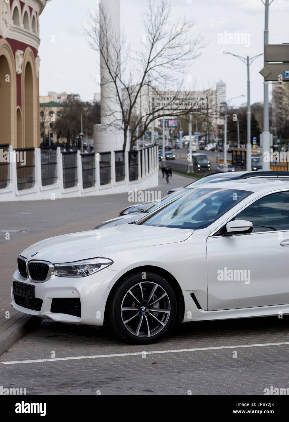 Minsk, Belarus, July 2023 - Luxury white BMW in city. Beautiful modern ...