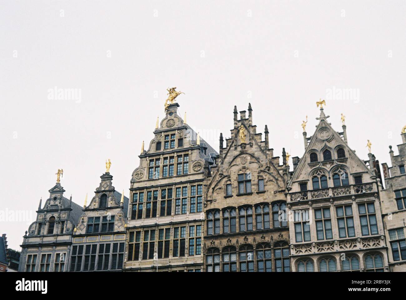 old antique historic buildings in antwerp with clear overcast sky, shot ...