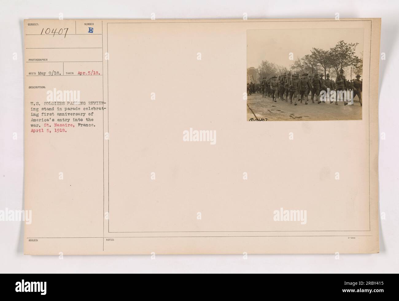 U.S. soldiers passing reviewing stand in a parade commemorating the ...