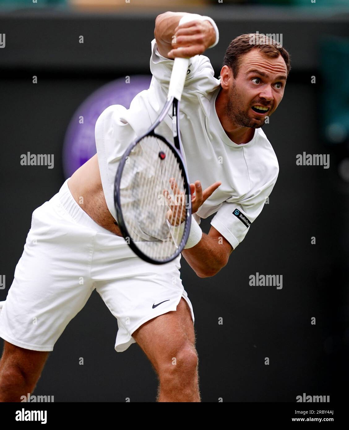 Roman Safiullin in action against Jannik Sinner during their gentlemen ...