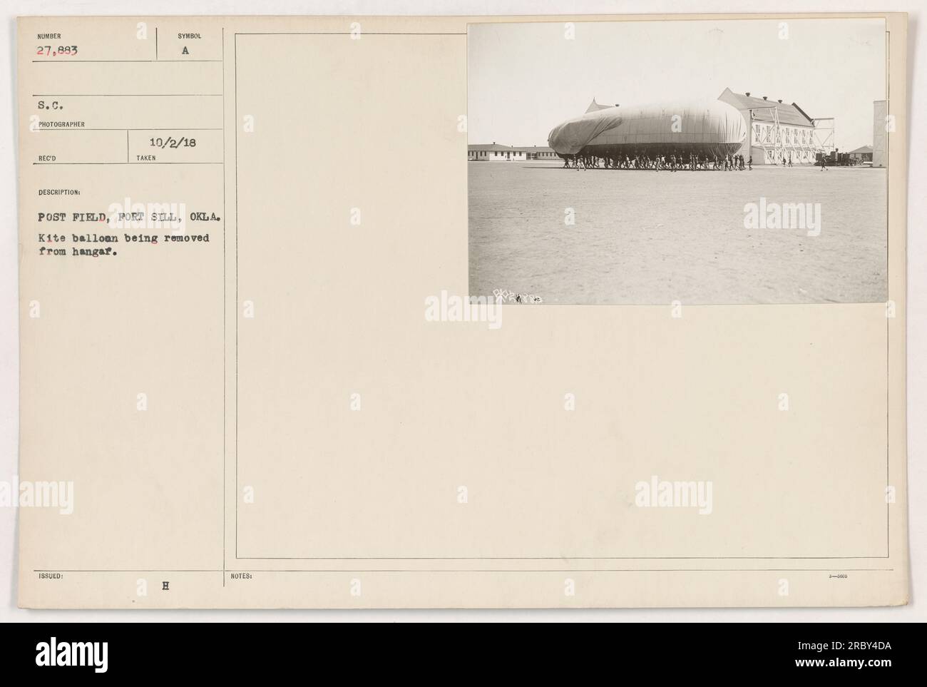 Image shows a kite balloon being removed from a hangar at Synsol A Post ...