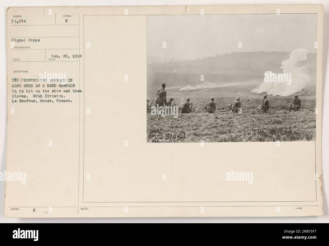 A soldier from the 80th Division of the US Army in World War I throws a ...