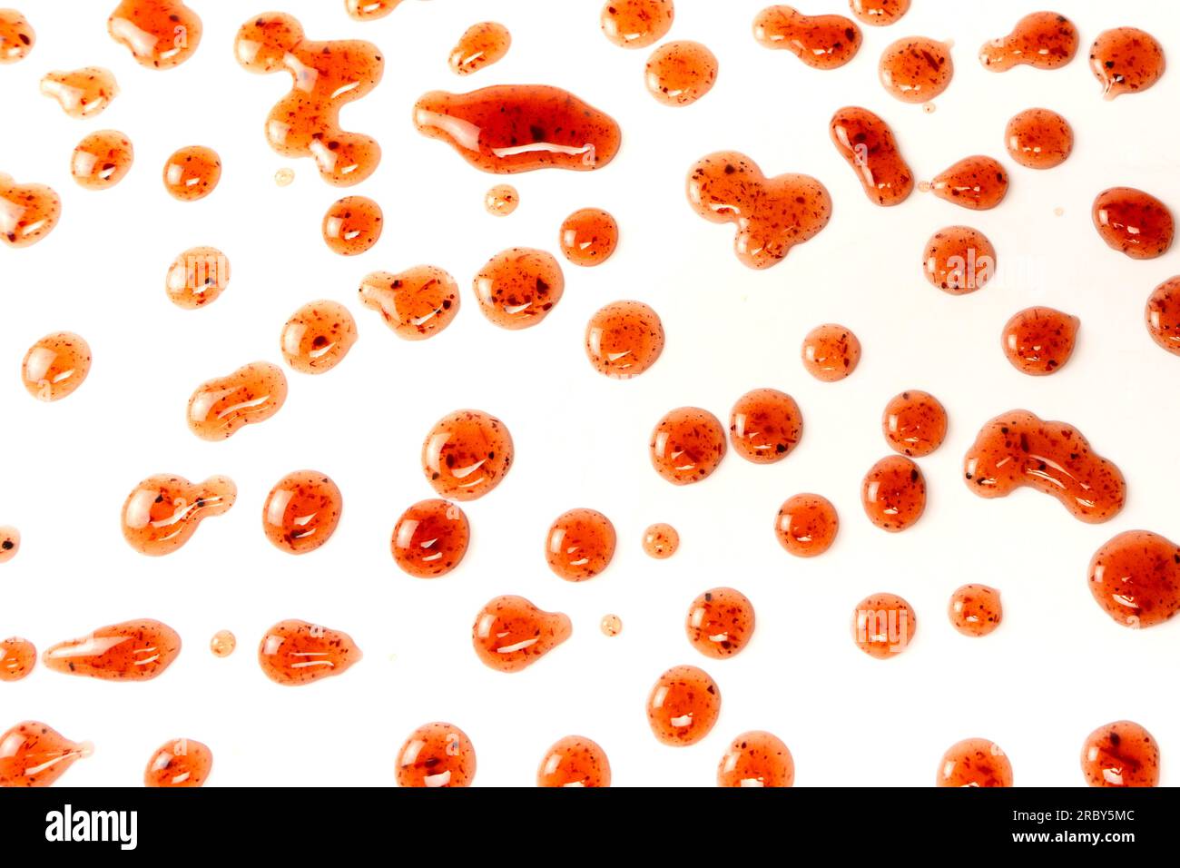 Red jam splashes isolated on a white background. Top view Stock Photo ...