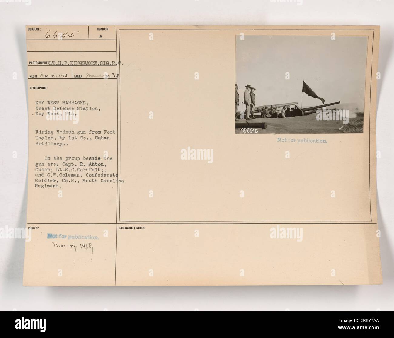 Members of the 1st Co. Cuban Artillery firing a 3-inch gun from Fort ...
