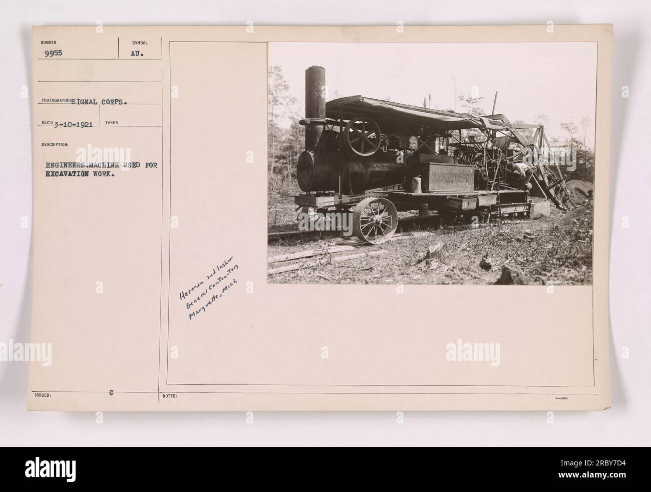 Engineers using a machine for excavation work during World War One. The ...