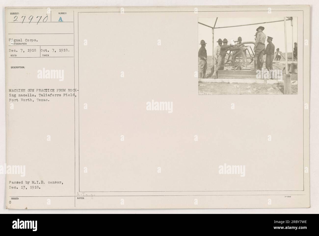 Soldiers practicing machine gun maneuvers from a moving aircraft at Taliaferro Field in Fort ...