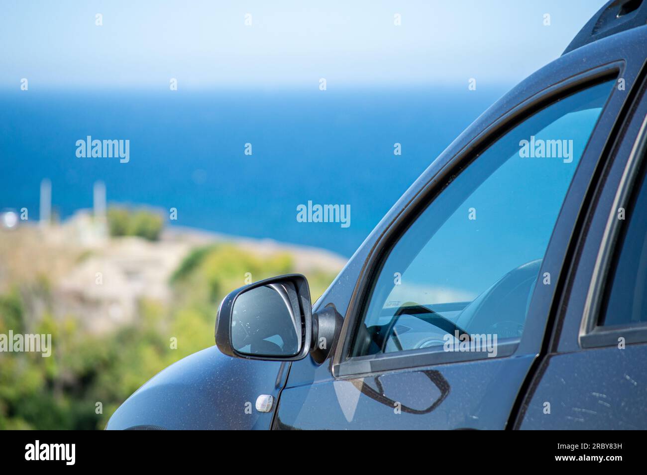 Car on hill in front of Gibraltar Strait, Spanish side in Tarifa, Spain ...