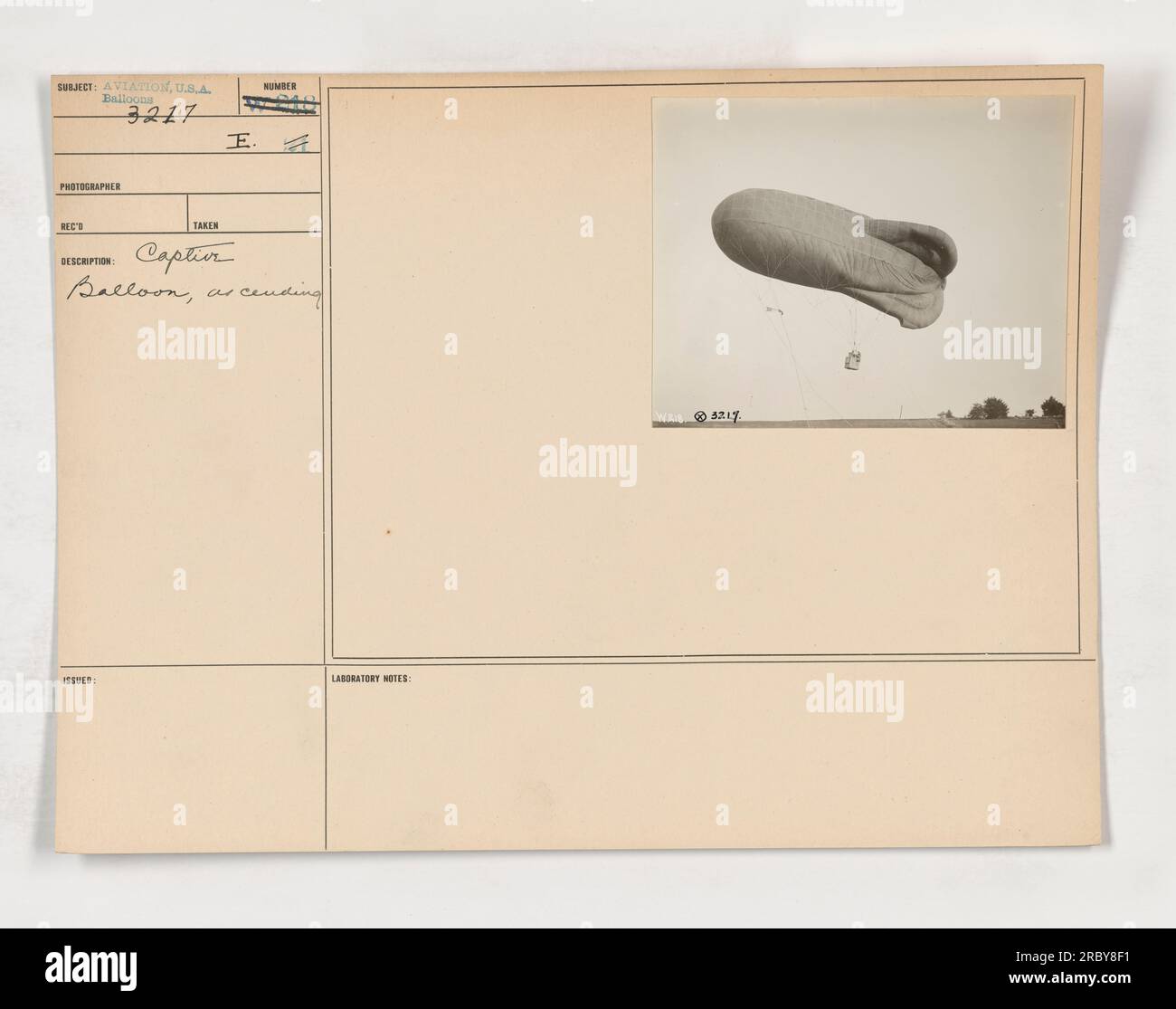 A captive balloon ascending in the sky during World War One. This ...