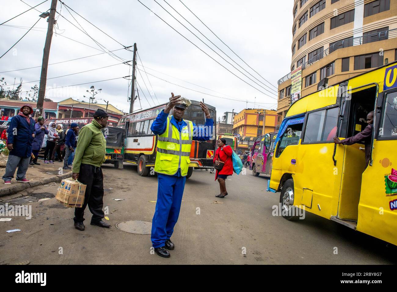 NAIROBI, KENYA-JULY 04, 2023: A traffic police officer takes control of ...