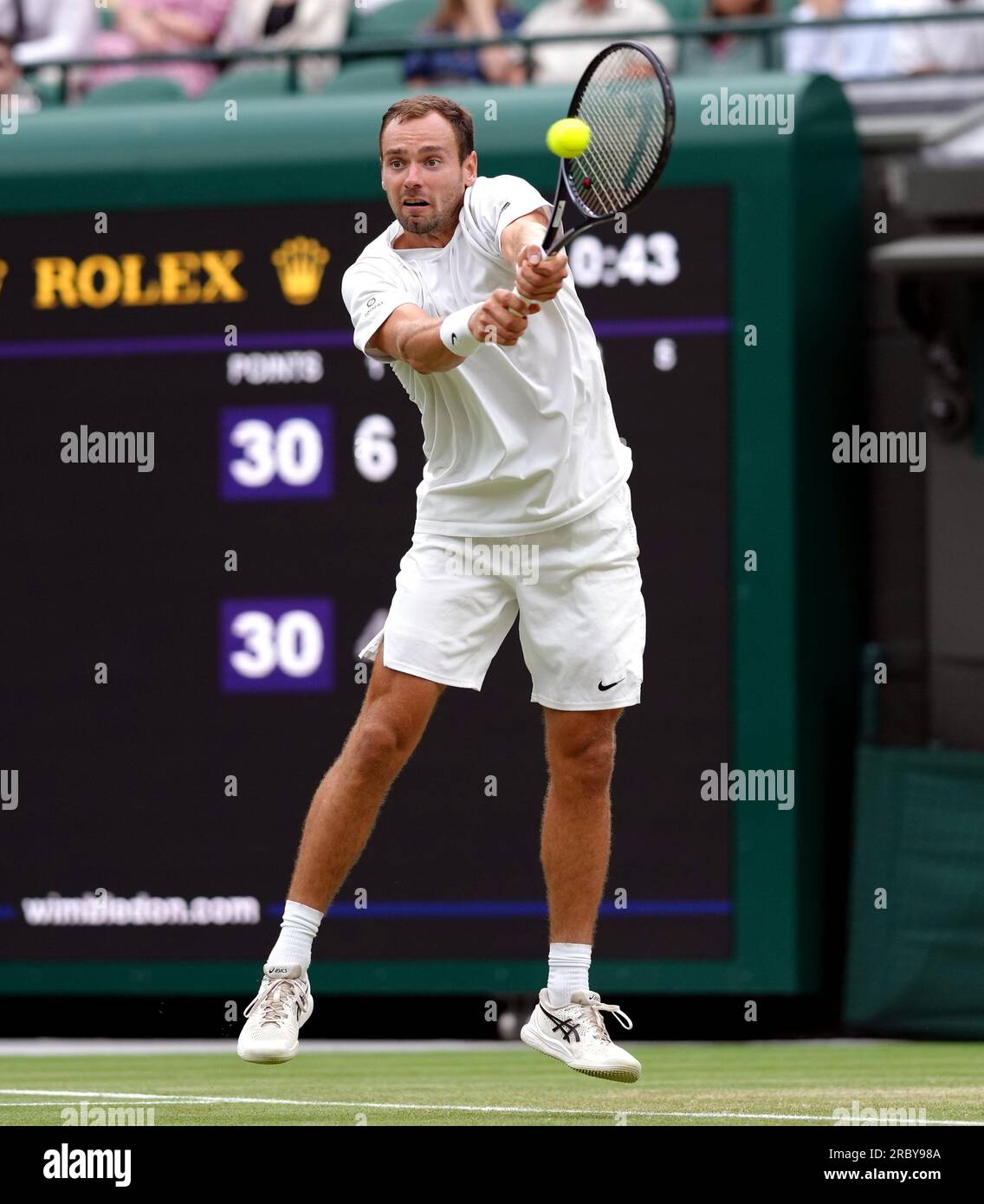 Roman Safiullin in action against Jannik Sinner during their gentlemen ...