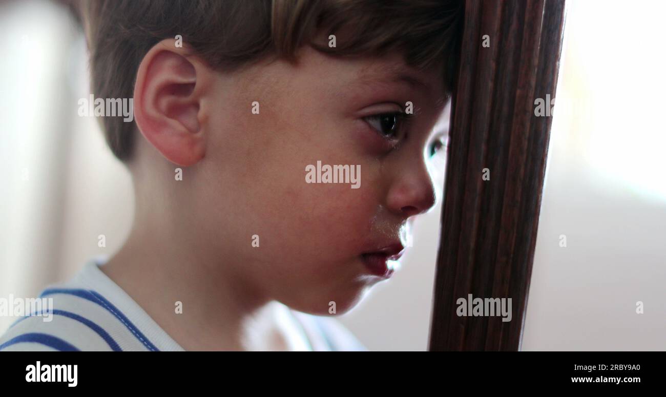 One sad little boy tearful child feeling displeased Stock Photo - Alamy