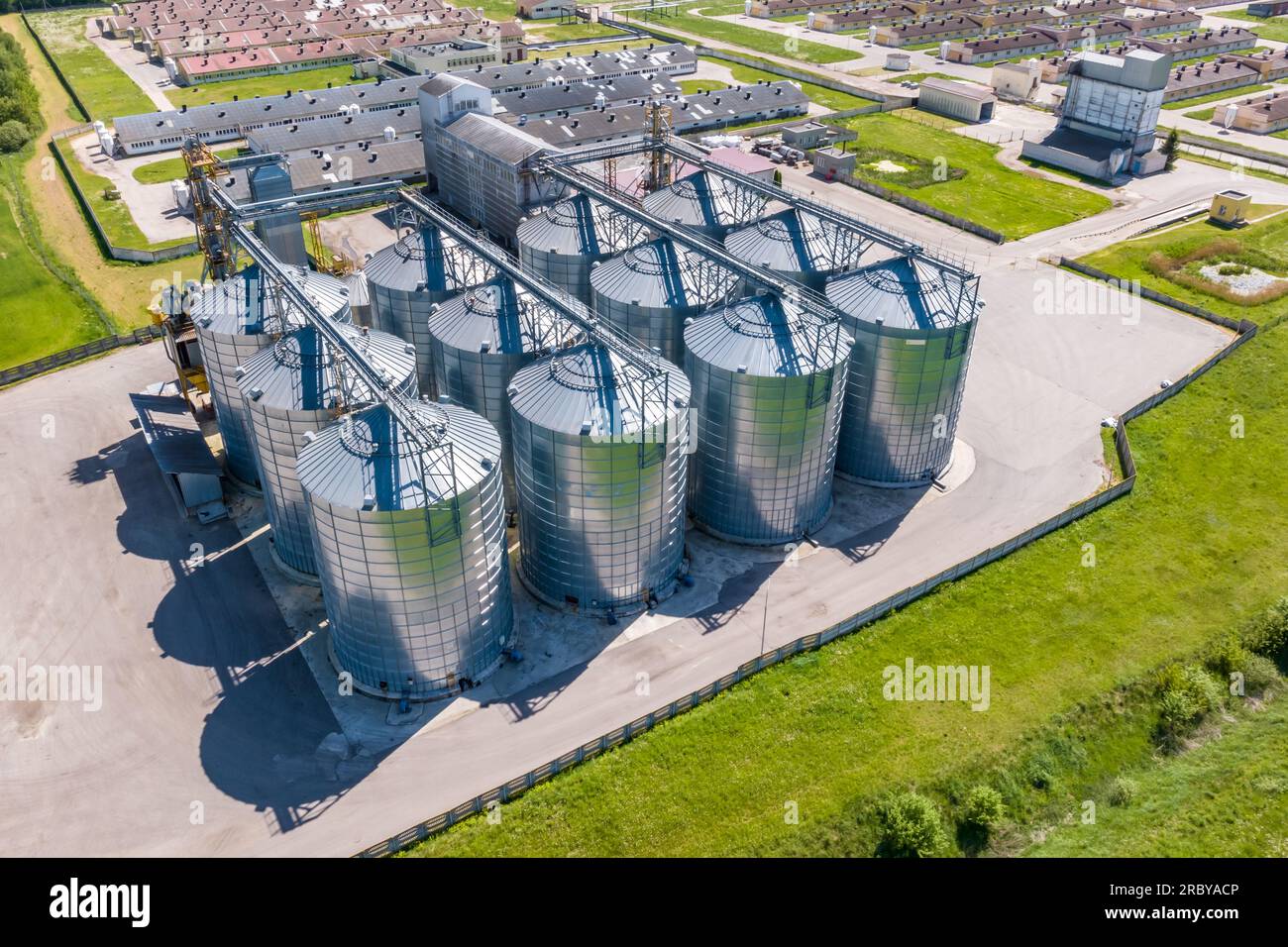 aerial panoramic view on agro-industrial complex with silos and grain ...