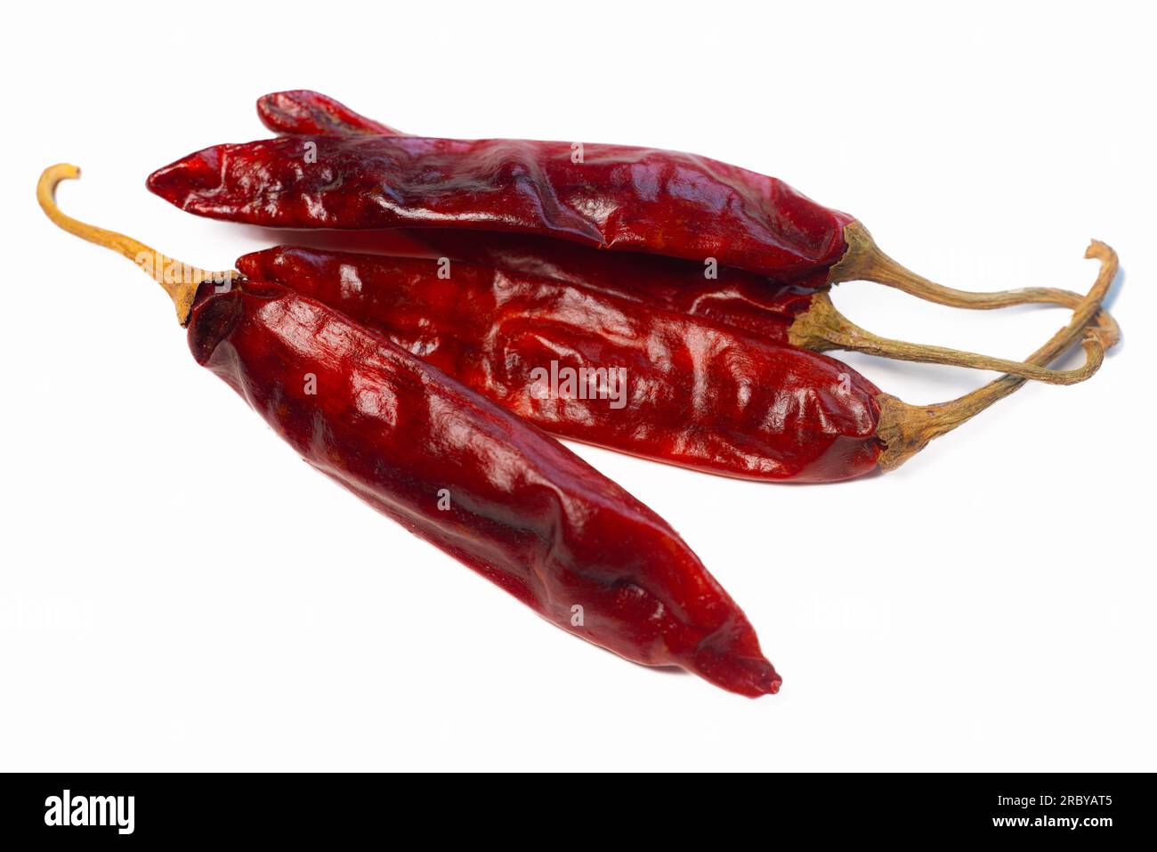 Bright Red dried red chillies are display on white background Stock ...