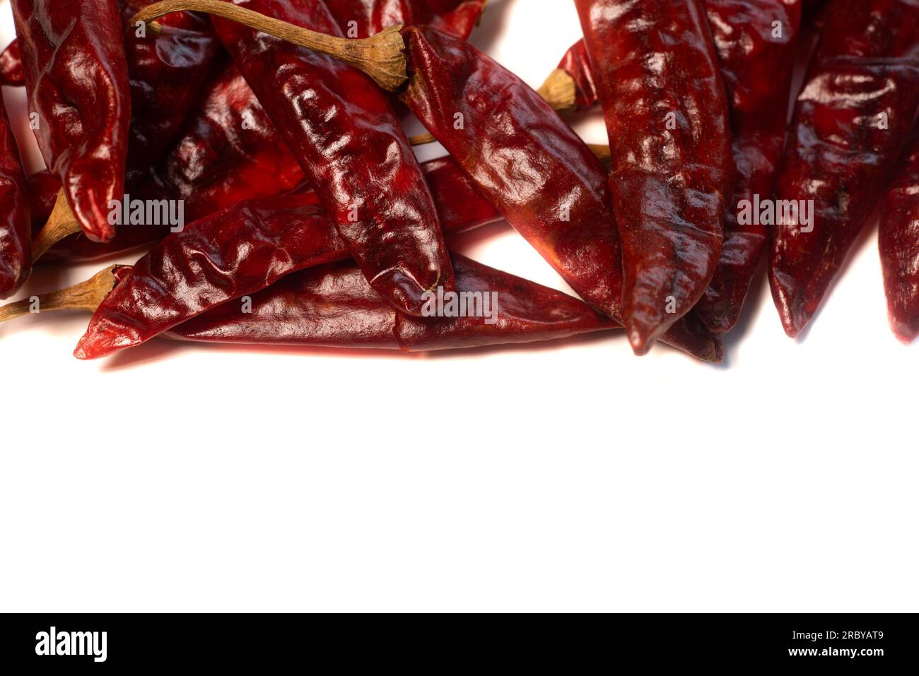 Bright Red dried red chillies are display on white background Stock ...