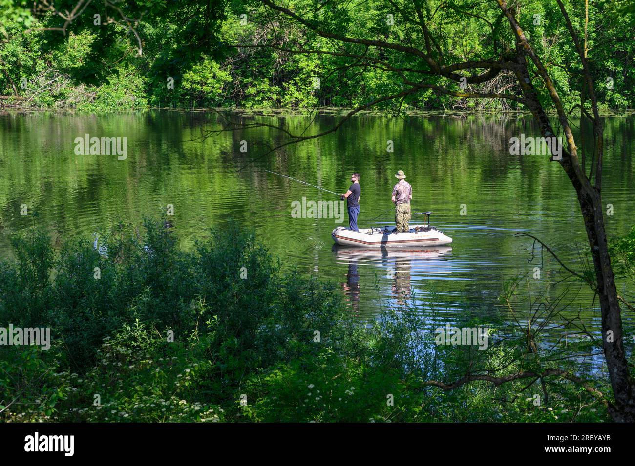 Anglers on the Sava river at Lonja. Lonjsko Polje Nature Park, Republic ...
