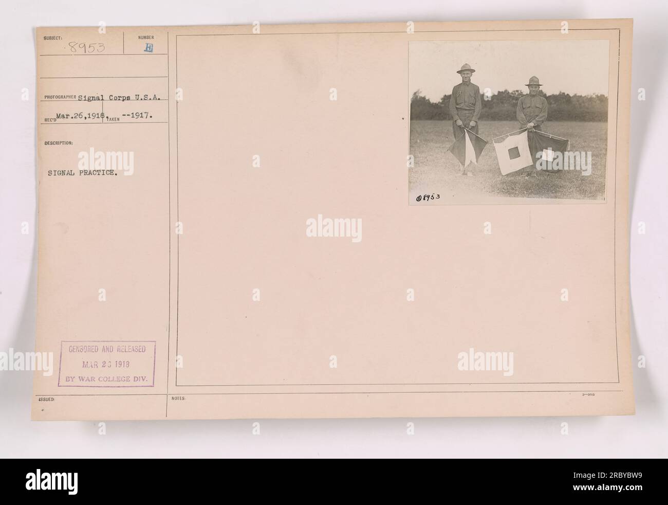 The image shows a group of soldiers engaged in signal practice during ...