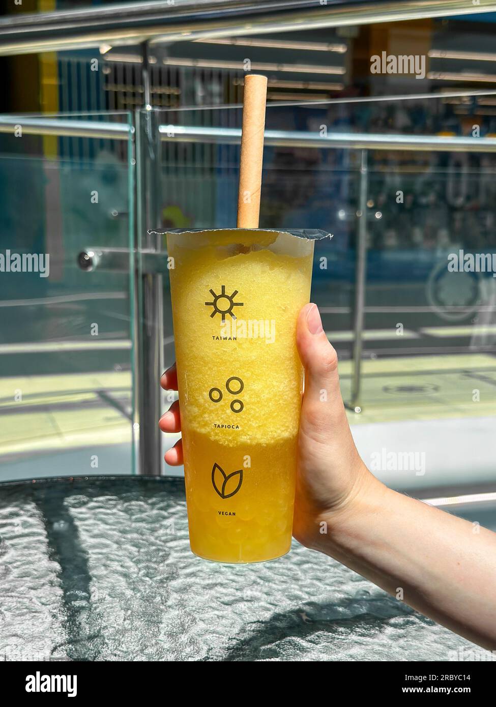 Fruit tapioca drink, Asian vegan beverage in hand Stock Photo - Alamy