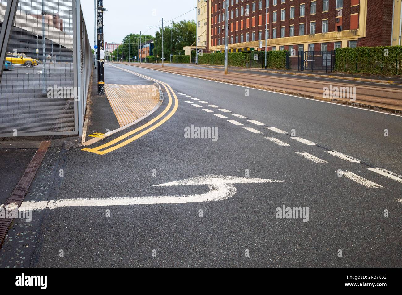 road markings at a give way junction on the road and white painted ...