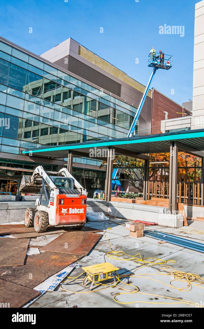 A Bobcat compact loader works in construction of a healthcare facility ...