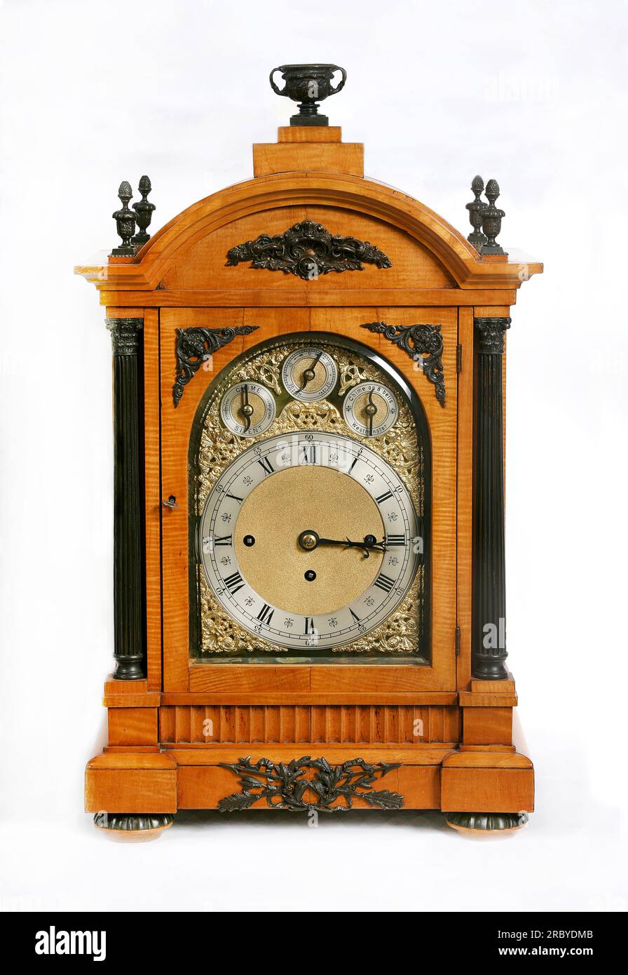 An antique wooden case bracket clock Stock Photo - Alamy