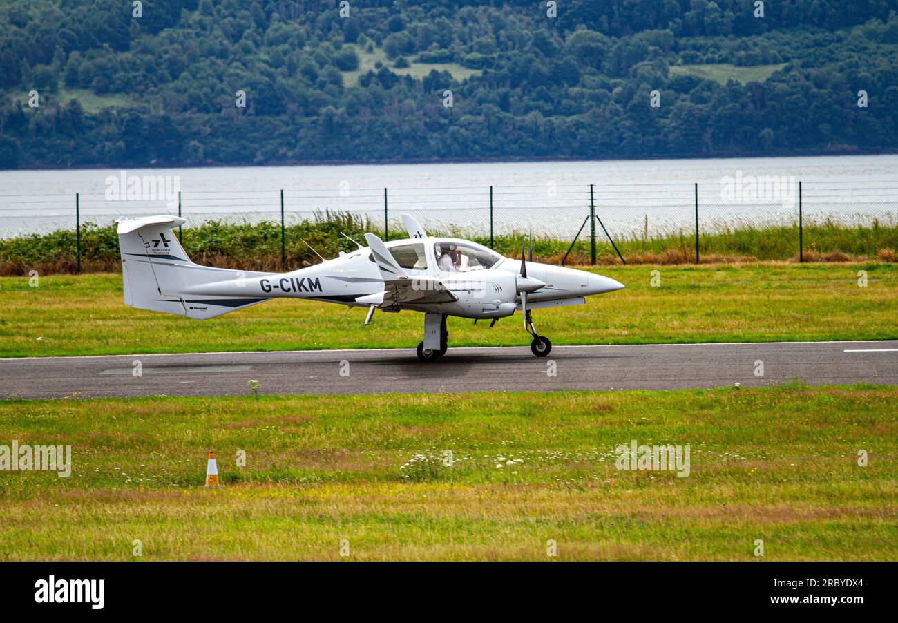 G-CIKM Diamond DA-42 Twin Star aircraft taking off from Dundee Riverside Airport, Scotland Stock ...