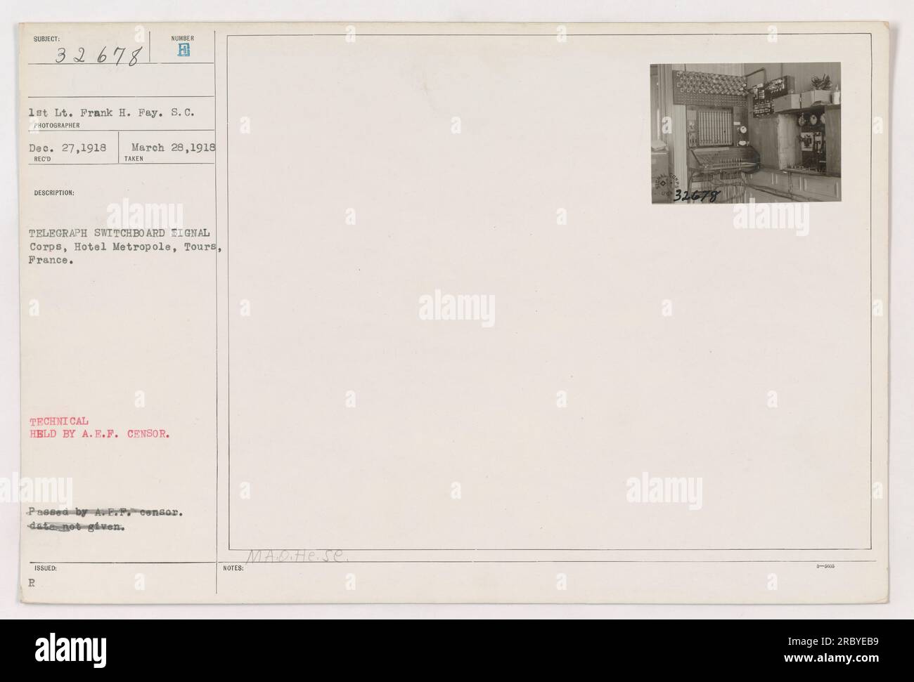 Caption: 1st Lt. Frank H. Fay operating a telegraph switchboard signal ...