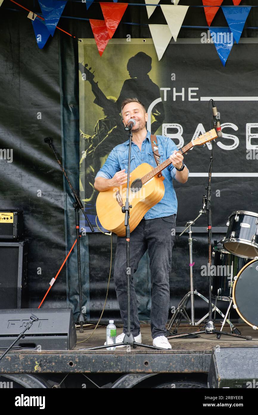 Singer Pete Cogavin playing at St Margaret Fair, Moormead Park ...