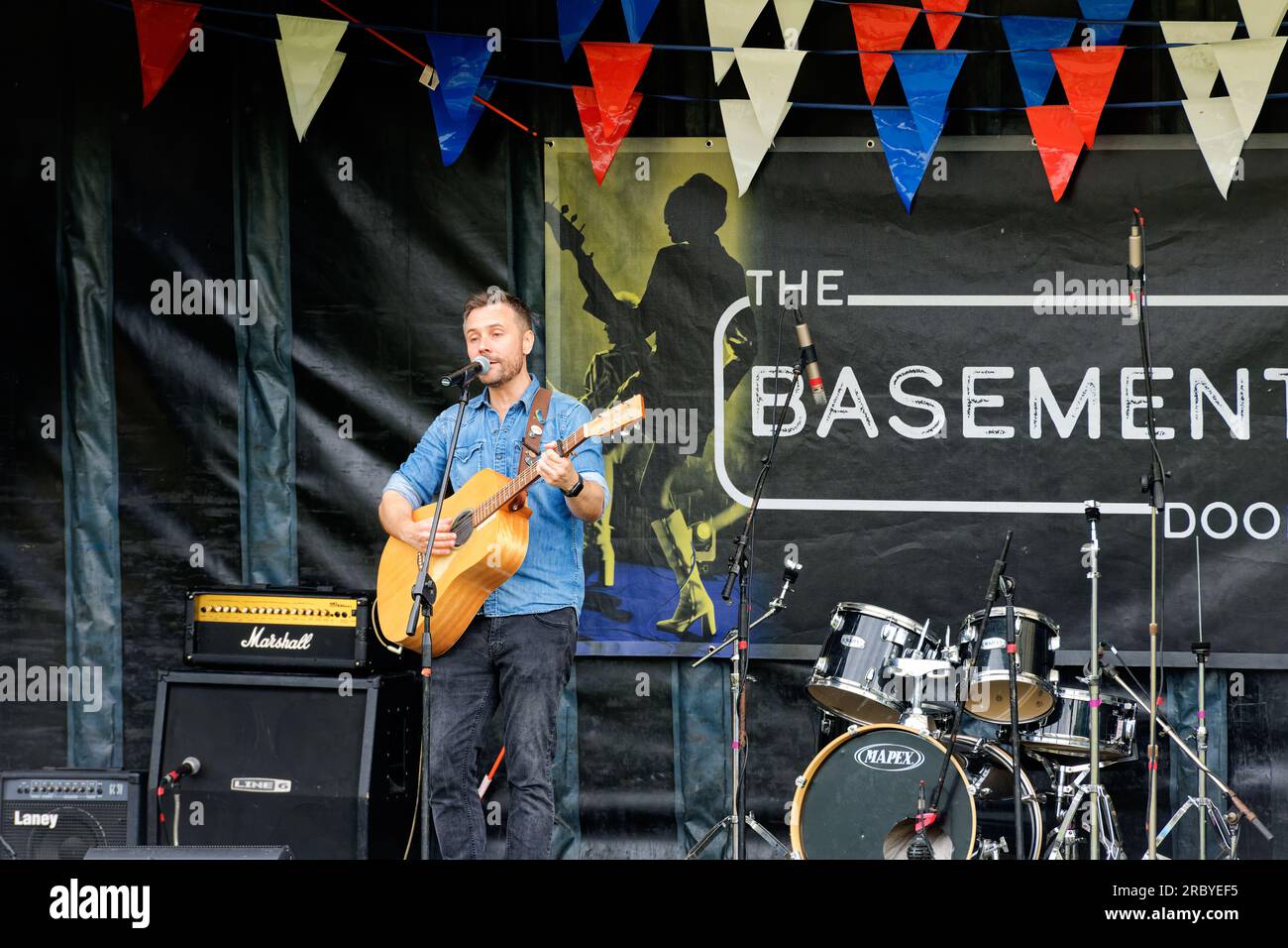 Singer Pete Cogavin playing at St Margaret Fair, Moormead Park ...