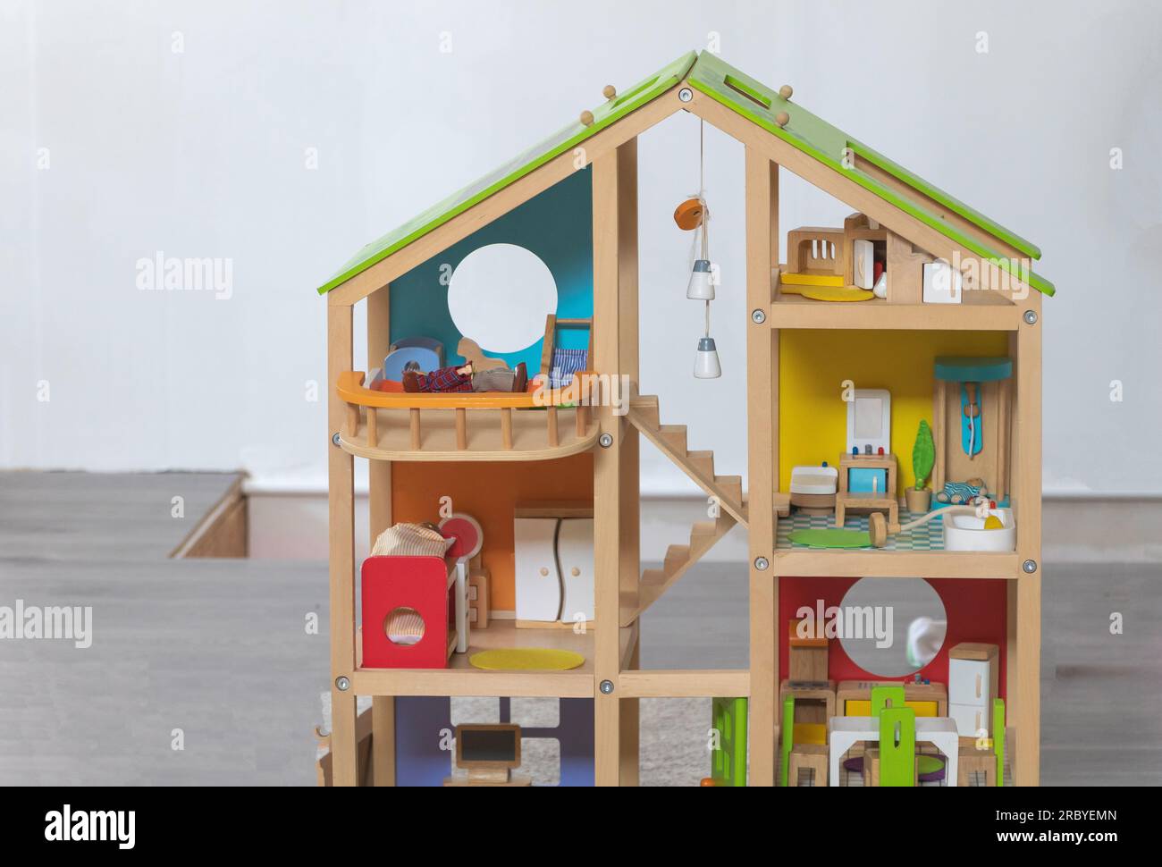 Wooden toy house in a children's playroom. Toys for children Stock ...