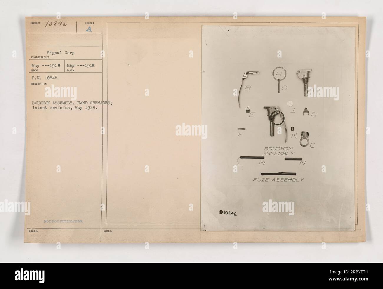 Image of soldiers at a bouchon assembly, working on hand grenades. This ...