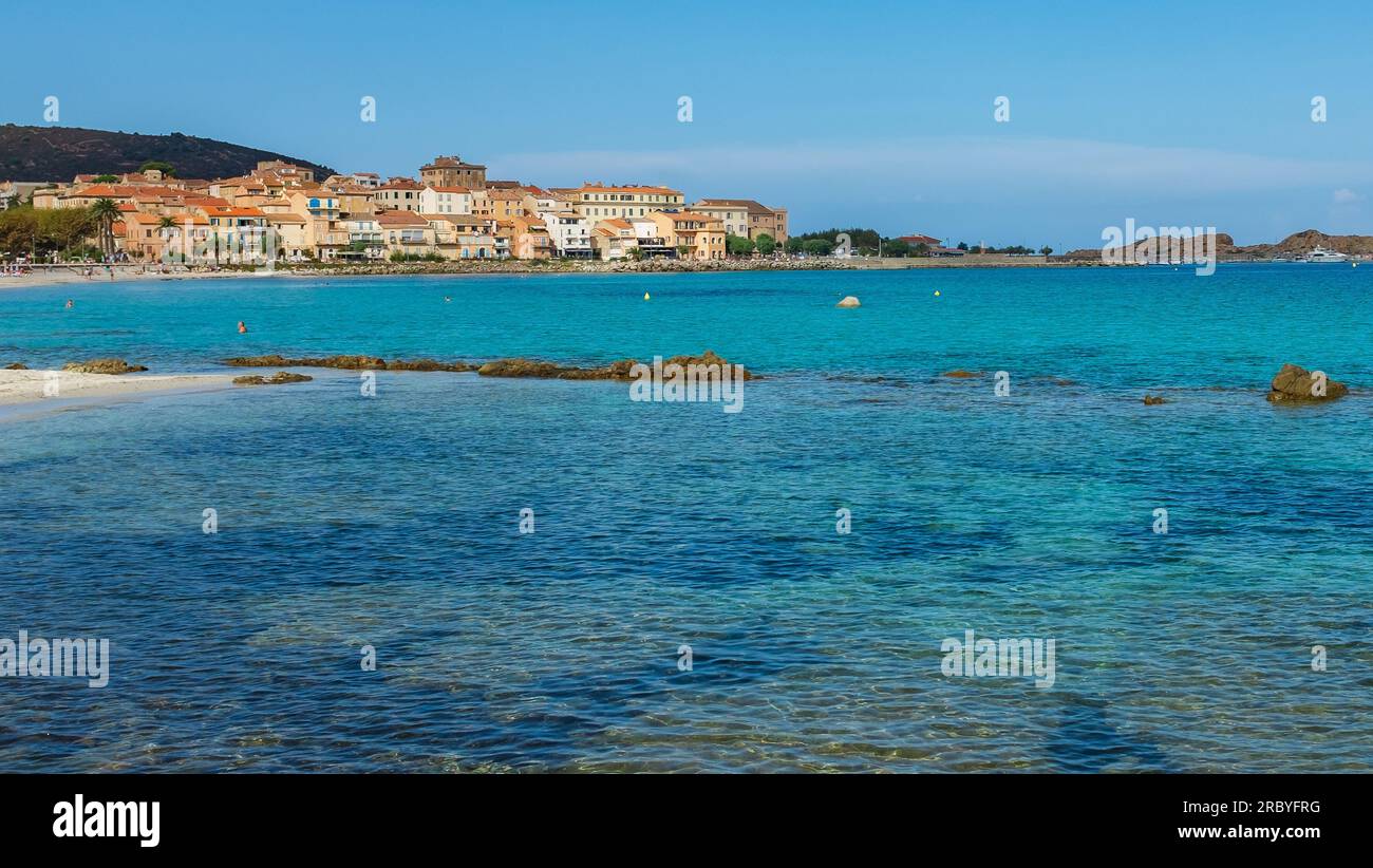 Ile Rousse, Corsica, 2020. View of l'Île Rousse, with bathers enjoying ...