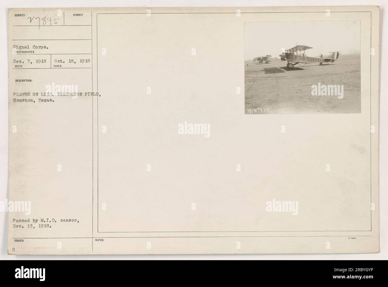 The image shows a line of planes at Ellington Field in Houston, Texas during World War One. The ...