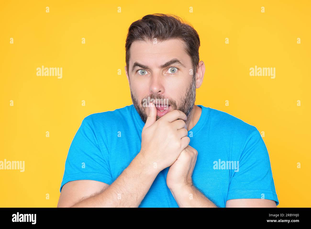 Portrait of shocked unshaven caucasian man afraid and shocked with ...